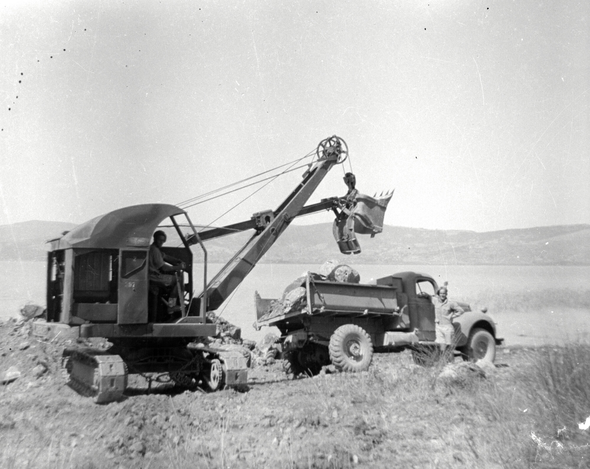 Military Service, World War II; engineers; excavator and Dodge VC half ...