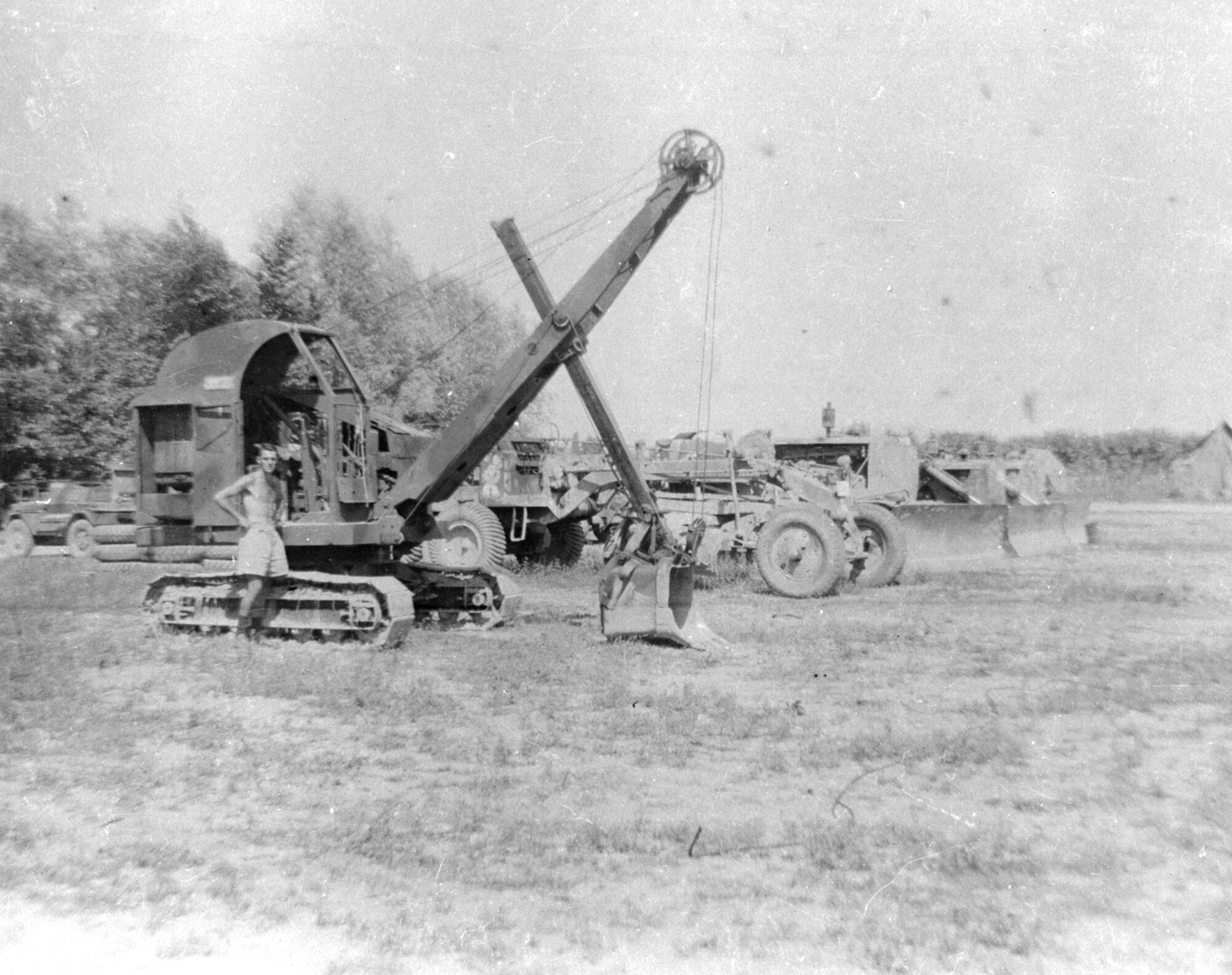 Military Service, World War II; engineers; excavator, grader ...