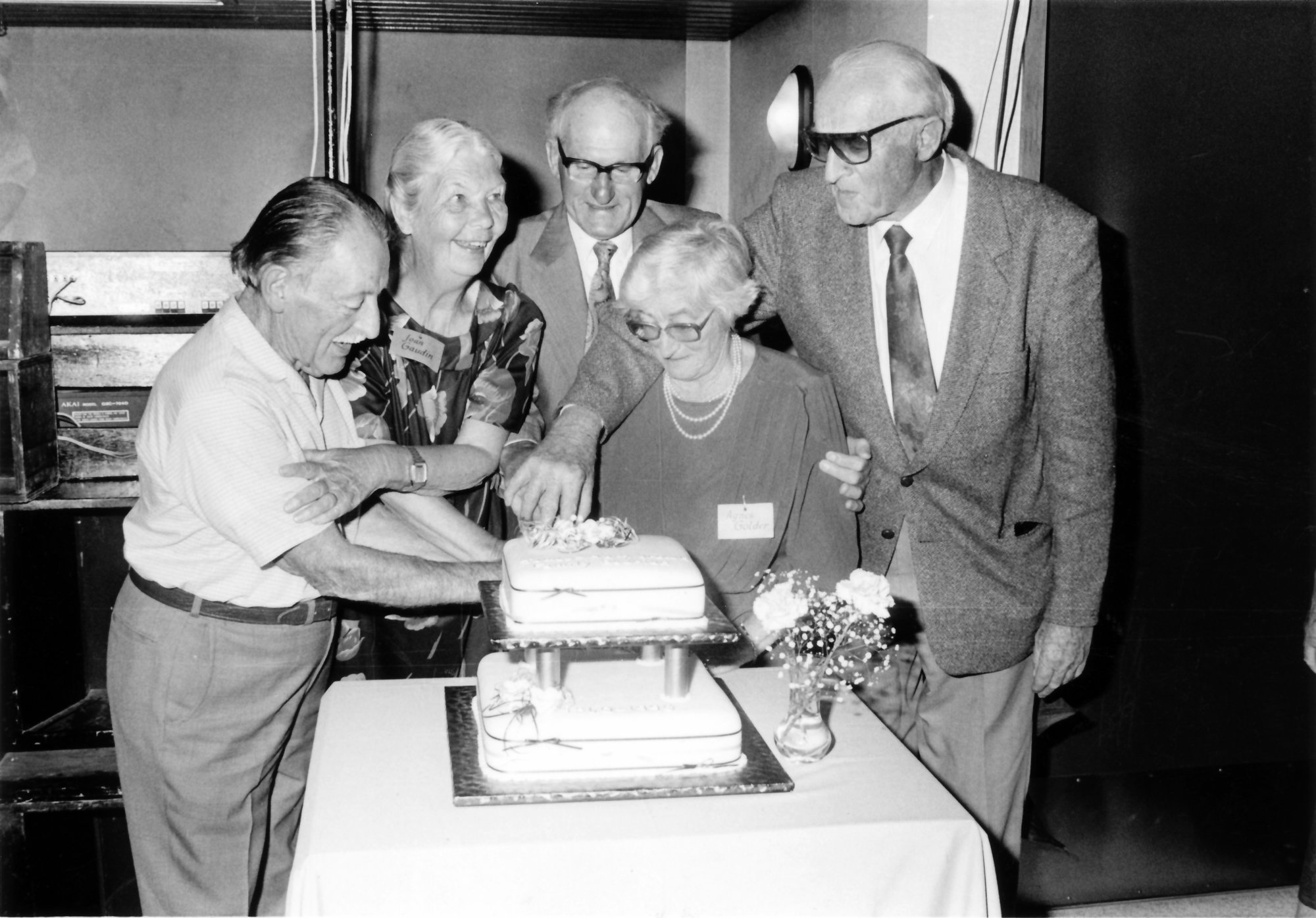 Brown Family reunion; cake being cut; Joan Gaudin, left, and Agnes ...