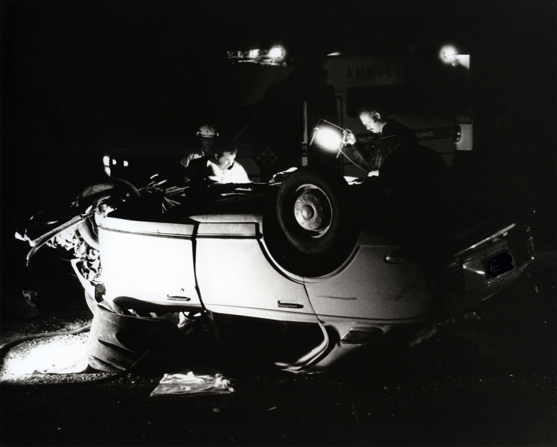 Akatarawa Road; car on its roof after it hits power pole near the twin ...